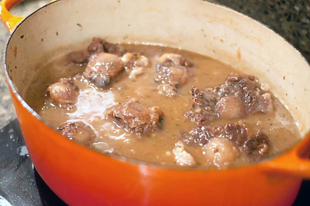Oxtail Stew served over fluffy rice from Never Enough Thyme